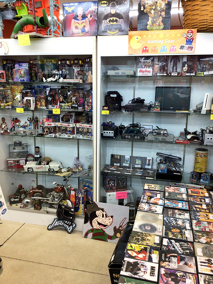 Gaming nostalgia overload! From classic consoles to action figures, this display cabinet is basically a time machine to your childhood Saturday mornings.