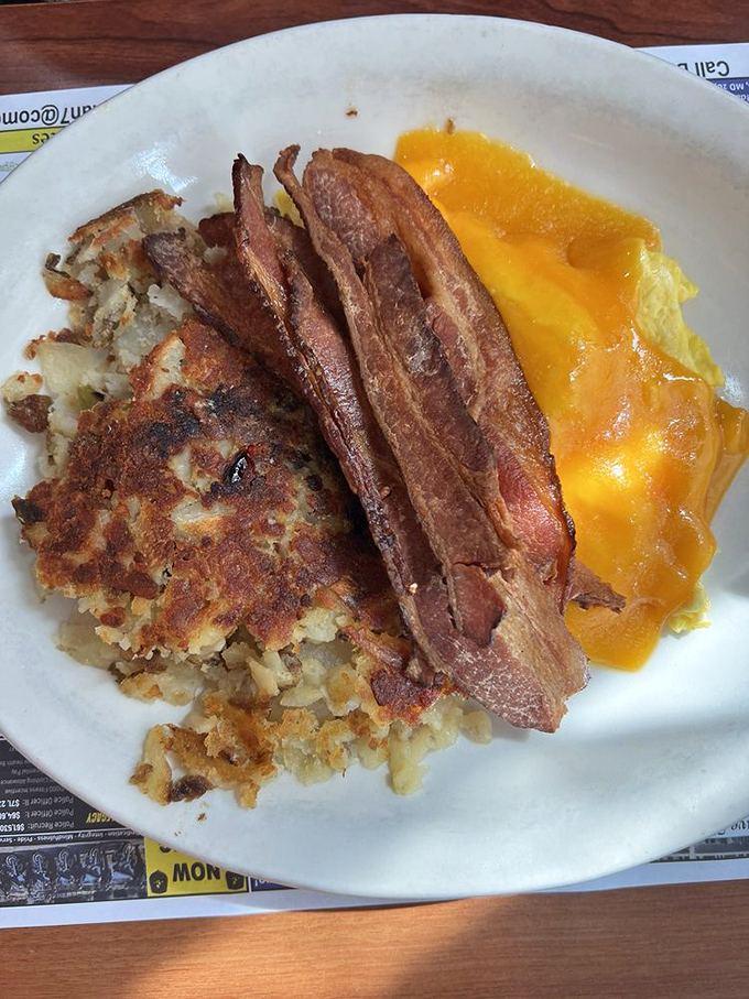 This isn't just breakfast&mdash;it's a still life painting titled "Morning in America," featuring eggs with sunset-orange yolks and perfectly crisped potatoes.