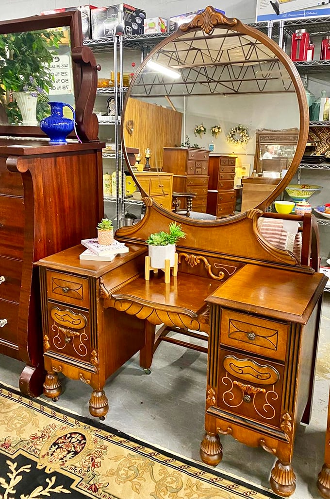 This vanity isn't just furniture; it's a portal to an era when getting ready was a ritual and craftsmanship meant hand-carved details that told stories.