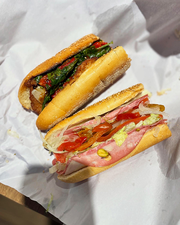 The Sophie's Choice of sandwich decisions. One dressed in roasted peppers and greens, the other flaunting cold cuts and sharp provolone.