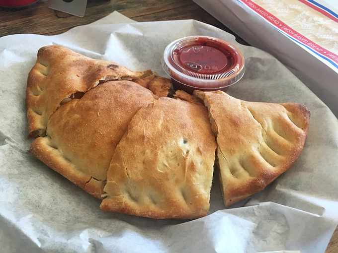 Who knew paradise could be shaped like a half-moon? This golden calzone proves that vegetables can indeed have all the fun.