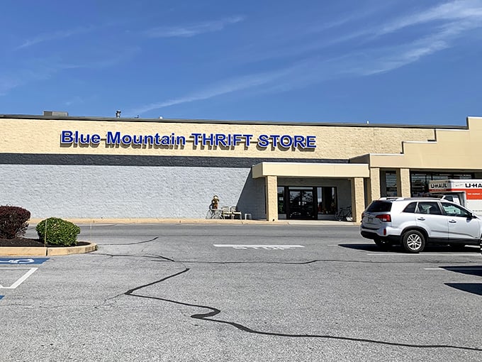 Blue Mountain Thrift's bold signage stands out against the sky, promising mountains of possibilities within.