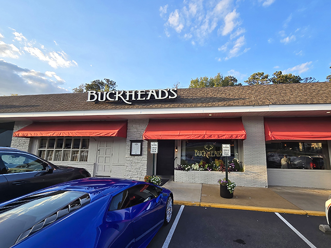Buckhead's modest exterior hides extraordinary flavors within. Those red awnings are like the understated packaging of a perfect gift.
