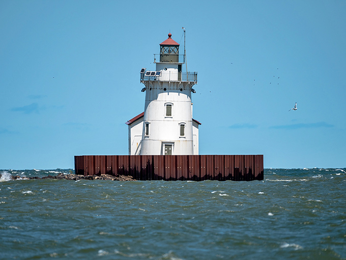 Cleveland's lighthouse looks ready for battle against Lake Erie's waves. This tough little tower has seen it all!