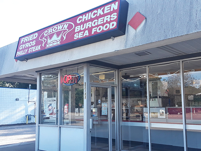 Behind those glass doors lies a world where crispy, golden chicken reigns supreme over an impressive menu.