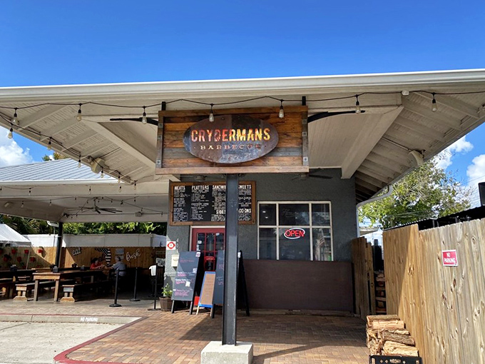 Crydermans' modern take on barbecue includes string lights, stacked wood, and meats that would make a vegetarian reconsider.