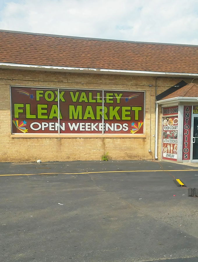 Small town charm, big market energy! Fox Valley Flea Market's colorful sign promises weekend adventures for bargain hunters.