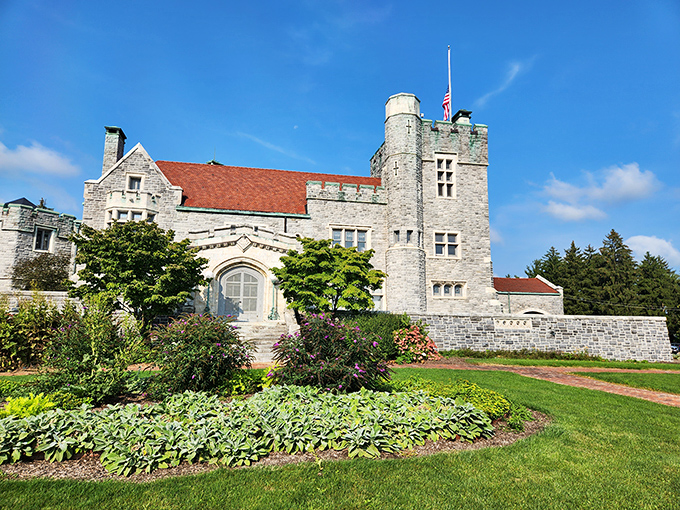Welsh inspiration under Ohio skies. That red roof pops against gray stone like a European postcard.
