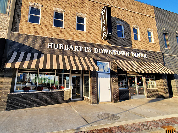 Hubbartt's Downtown Diner's classic awnings and brick facade &ndash; small-town charm with big breakfast energy.