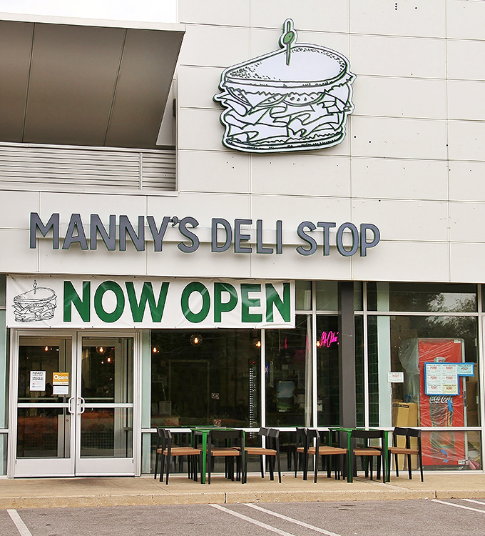 Manny's modern storefront with its giant sandwich sign makes a promise that the food inside absolutely keeps.