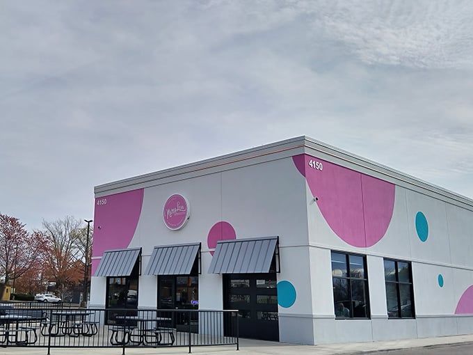 Mary Lou's playful pink polka dots hint at the joy waiting inside this Lafayette donut destination.