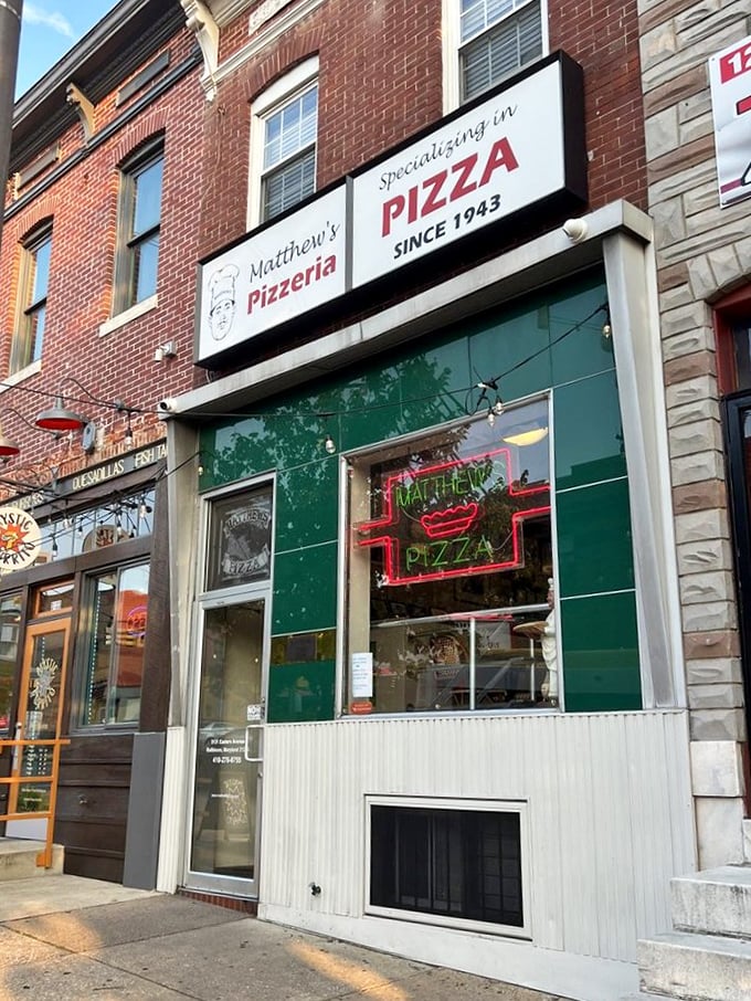 Matthew's vintage storefront looks like it belongs in a movie about great pizza. Since 1943, that green facade has welcomed Baltimore's pizza lovers.