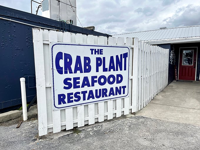 The blue door beckons seafood lovers to a place where "crab plant" isn't just a name – it's a delicious promise.