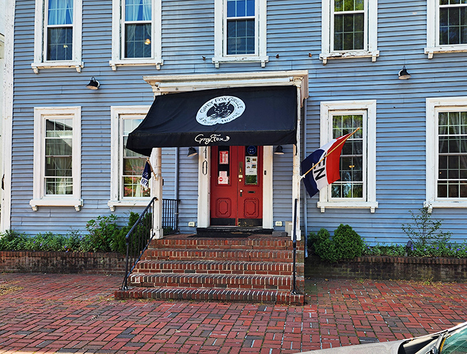 The Grey Fox Grille's historic blue colonial building brings unexpected elegance to the humble burger experience.