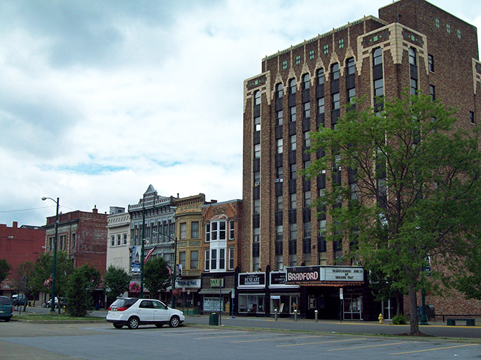 Historic Bradford building stands proudly against blue skies. Inside might be your affordable retirement dream home!