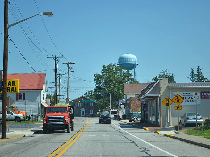 Bridgeville's water tower watches over a community where living costs stay grounded. This small town proves retirement dreams don't need big city prices.