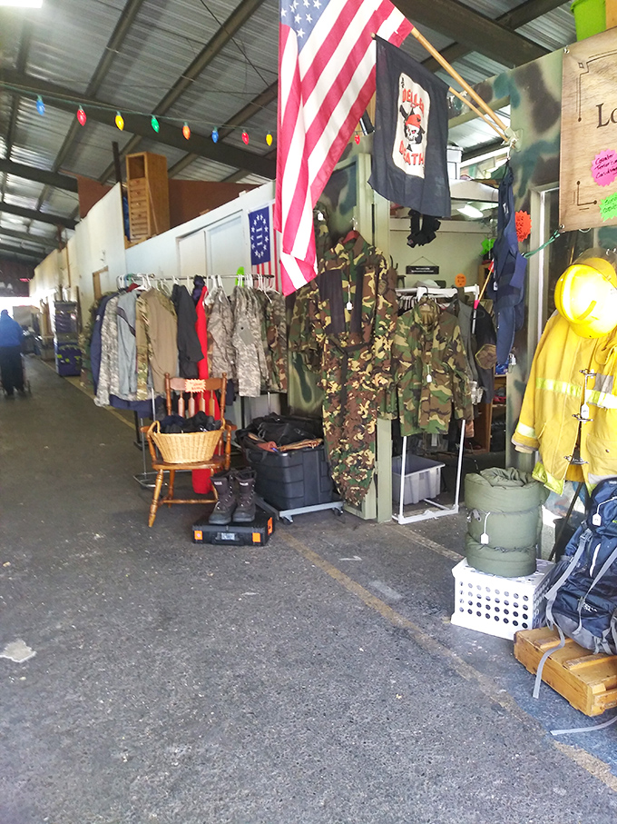 Military surplus meets vintage collectibles at Capitol City Marketplace. That American flag signals patriotic shopping ahead!