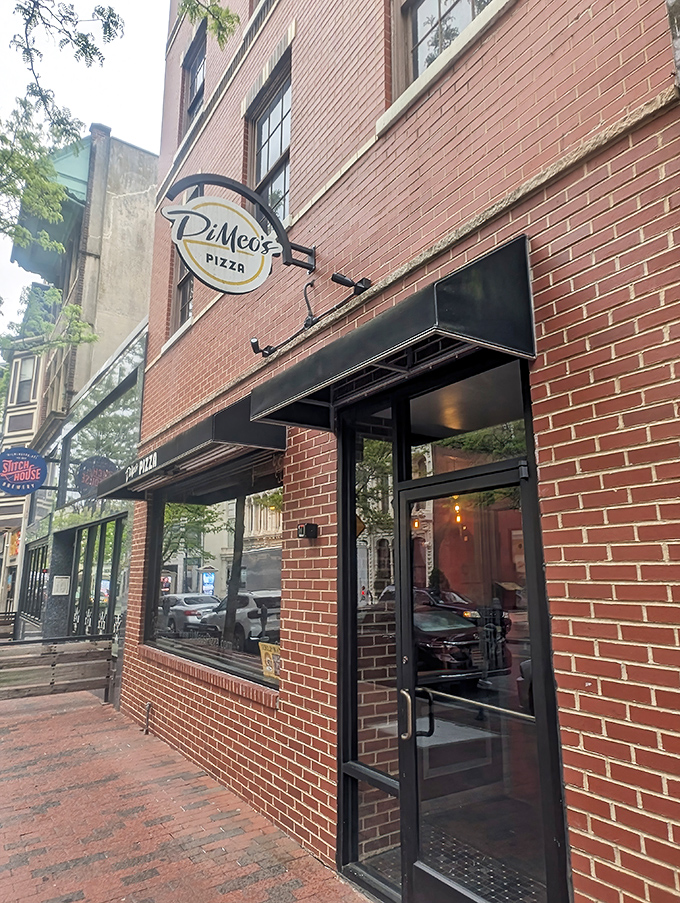 Simple black awning, classic brick building&mdash;DiMeo's lets its Neapolitan-style pizza be the real showstopper.