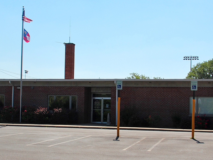 Euharlee's town entrance greets visitors with open road vibes – where main street and adventure begin with equal promise.