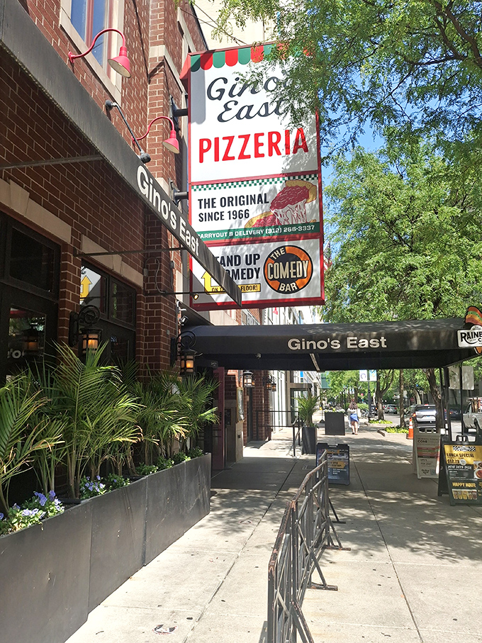 The classic red, white and green signage of Gino's East promises an authentic slice of Chicago pizza history.