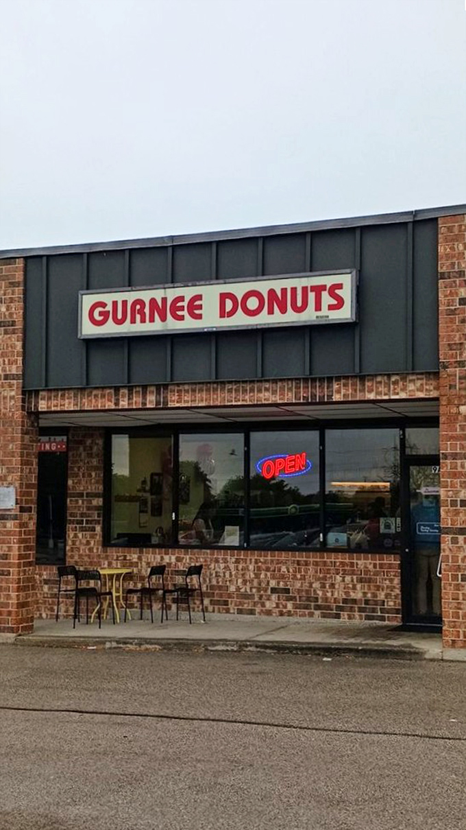 Gurnee Donuts keeps it old-school with their no-nonsense approach. That "OPEN" sign might be the most welcome sight in town.