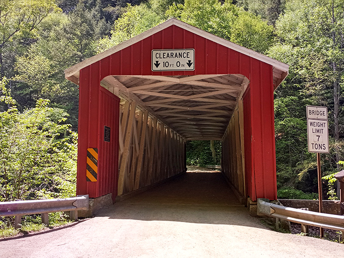 The 10-foot clearance sign isn't just a warning&mdash;it's an invitation to duck inside and discover this wooden masterpiece.