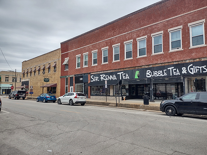 The historic storefronts of Lincoln create a welcoming streetscape where empty benches invite you to sit and watch the world roll by.