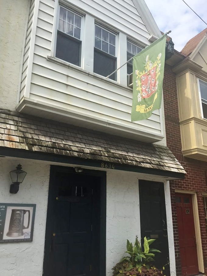 That green family crest flag signals you've found McNally's—home of the legendary Schmitter sandwich and generations of happy customers.