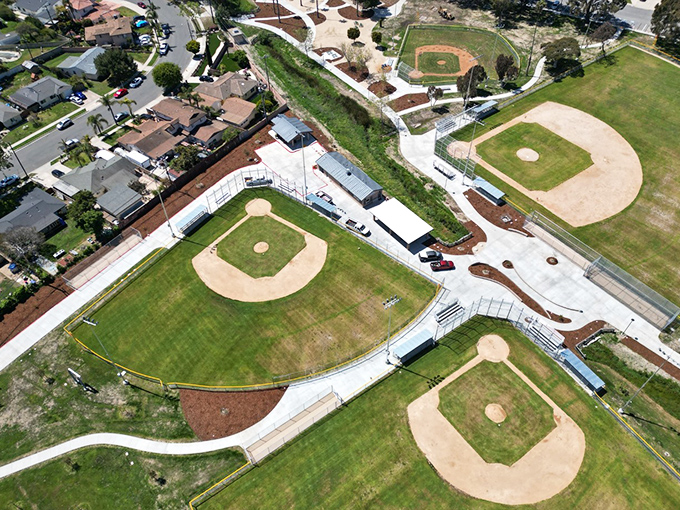 Baseball diamonds sparkle in the California sun. Port Hueneme offers simple pleasures and community spaces without the premium coastal price tag.