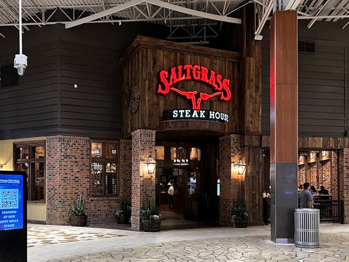 Behind those rustic wooden walls lies a Texas-sized steak experience that'll have you dreaming of cattle drives and campfires.