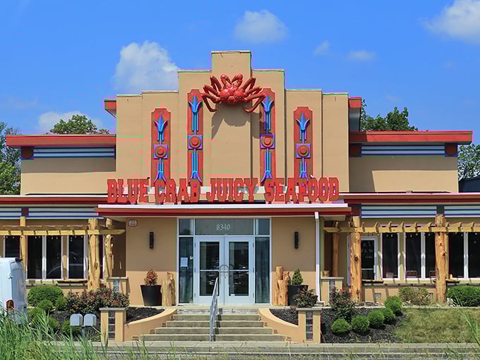 The dramatic entrance at Blue Crab Juicy Seafood promises a seafood experience as bold as its architecture.