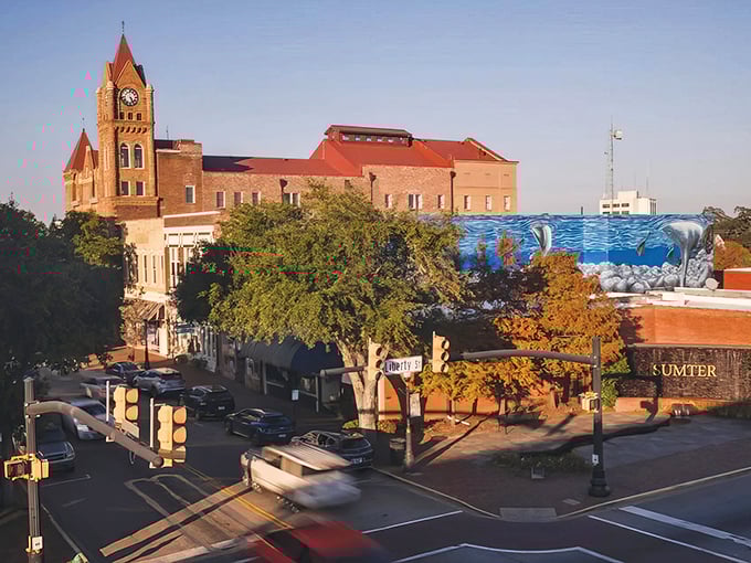The warm glow of sunset highlights Sumter's historic architecture, where red brick buildings have witnessed generations of slow-paced Southern living.