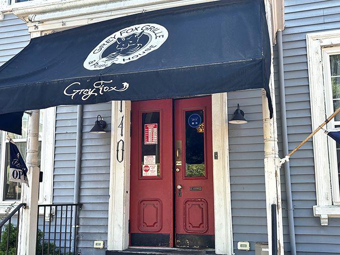 Red doors beckon beneath a classic awning &ndash; history and hamburgers make surprisingly perfect partners here.