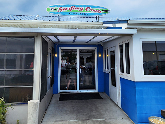 Evening light makes The Surfing Crab's entrance glow like a beacon for those seeking crab-cracking salvation after a day at the shore.