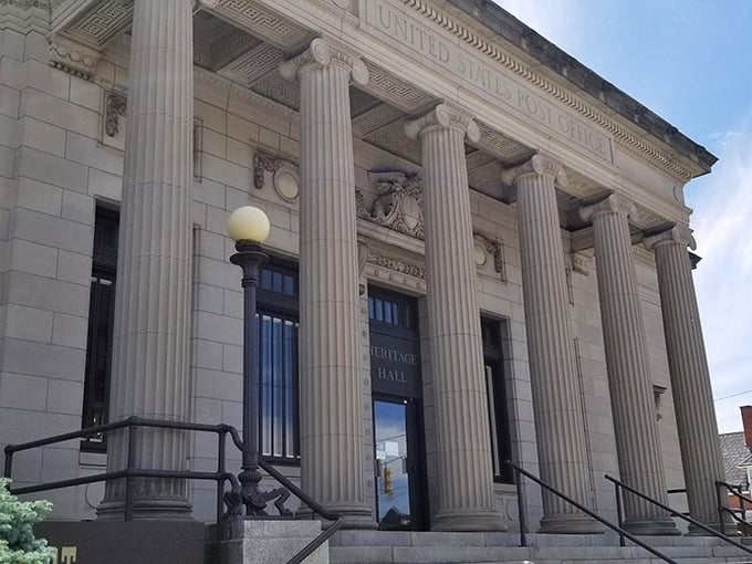 Stately columns guard the entrance to popcorn paradise. Like the Lincoln Memorial, but with more butter and salt!