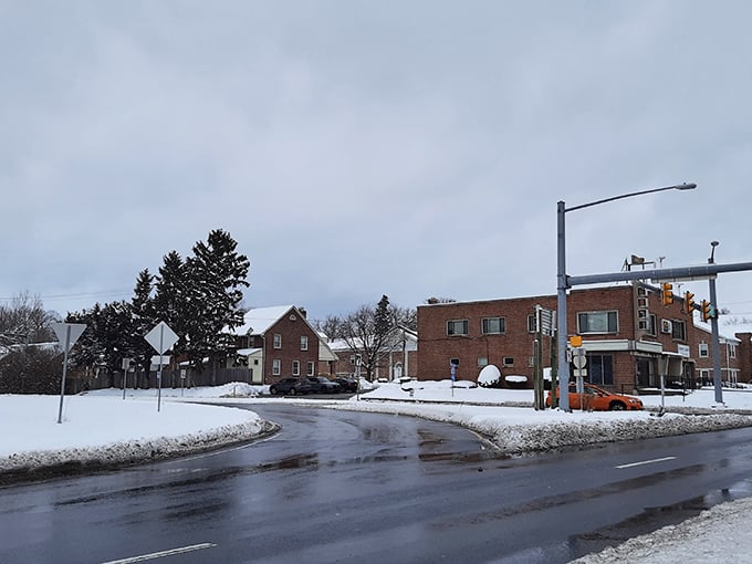 Snow dusts the quiet intersection of this York neighborhood, where winter beauty comes at no extra charge to residents.