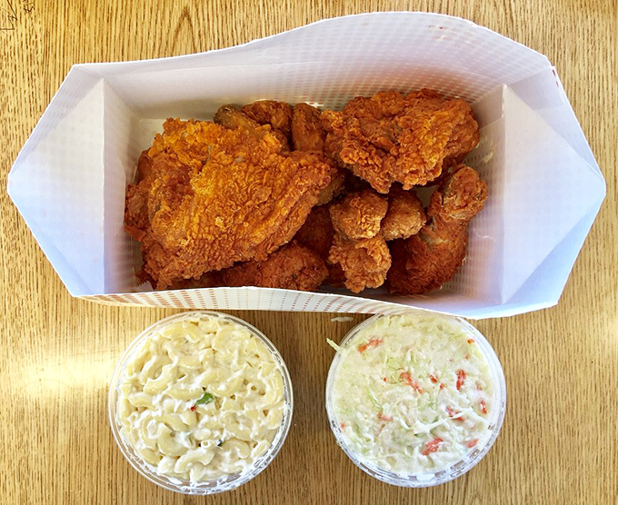 The ultimate family feast: golden fried chicken with creamy mac and cheese and coleslaw. This isn't just dinner&mdash;it's an event worth celebrating.