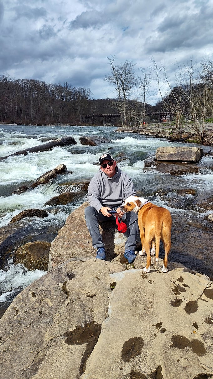 Man and dog: the original hiking duo since time immemorial. Some friendships are best nurtured beside rushing water and ancient stones.