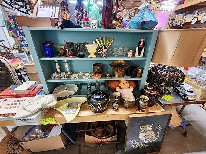 Vintage treasures arranged with loving care&mdash;that blue shelf holds someone's memories waiting to become part of your home's story.