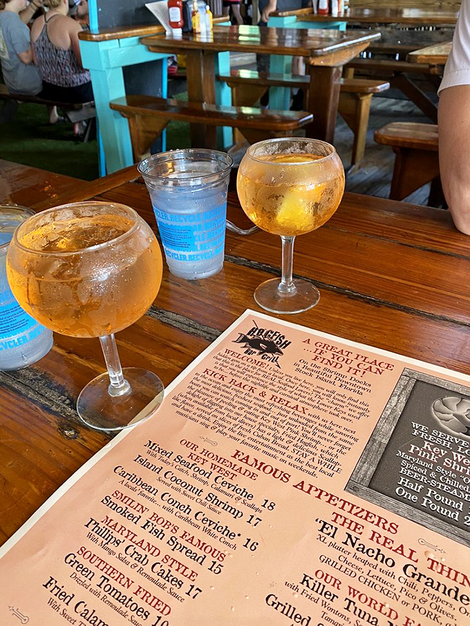 Two golden spritzes catching the afternoon light&mdash;liquid sunshine in glassware that says, "Your conference call emails can wait until tomorrow."