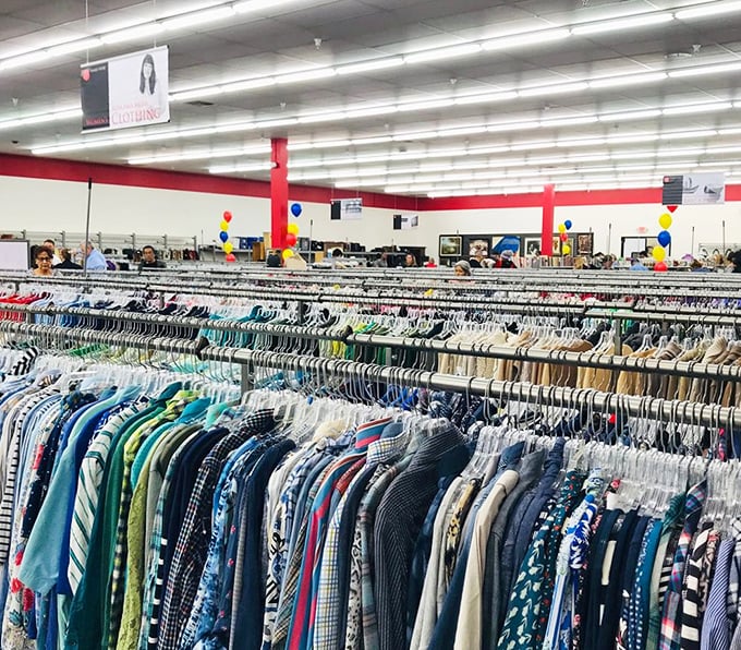 A rainbow of possibilities hanging in perfect formation&mdash;each garment holding stories of previous lives while awaiting new adventures.