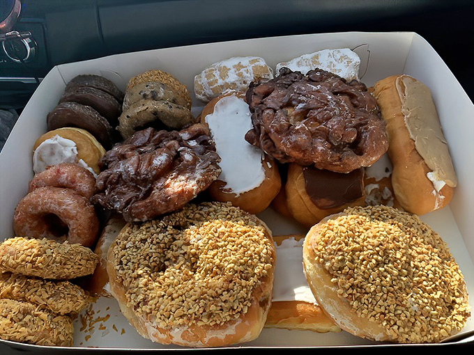 Donut diversity at its finest. From maple-topped beauties to peanut-crusted creations, this box holds enough joy to power you through any Monday.