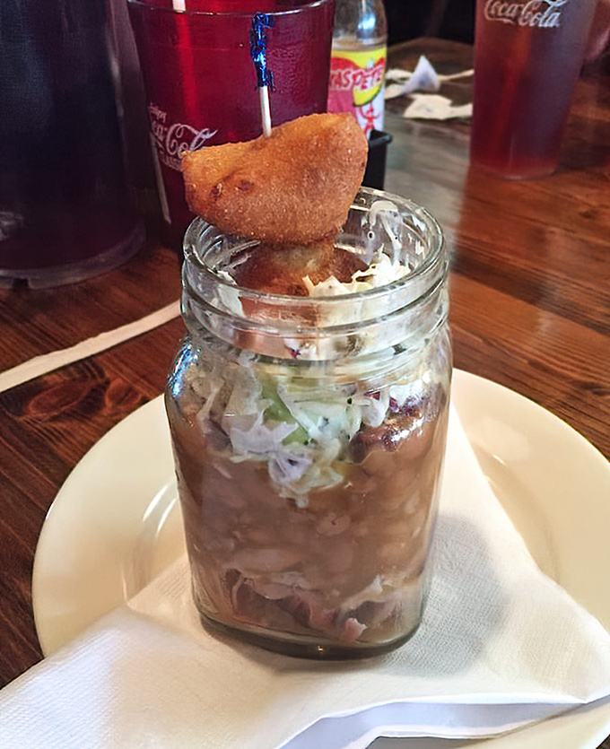 The BBQ Sundae&mdash;where pulled pork, beans, and slaw stack up in a jar like layers of delicious geological history.