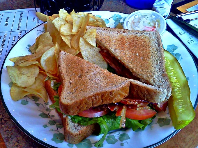This isn't just a sandwich; it's architecture. Crispy bacon, garden-fresh veggies, and potato chips create the ultimate lunch symphony.