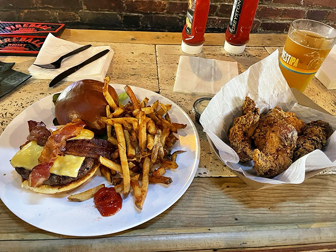 The bacon cheeseburger and wings combo that makes you question why you'd ever waste calories on trendy food. This is what satisfaction looks like.