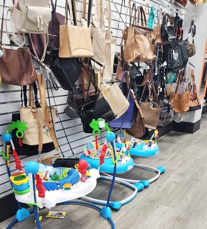 Handbag heaven meets baby bouncer bonanza. One corner of Sunshine Thrift solving multiple life crises simultaneously&mdash;from fashion emergencies to fussy infants.