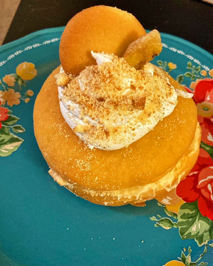 Banana cream pie reimagined as a donut. Whoever thought of this deserves a Nobel Prize in breakfast innovation.