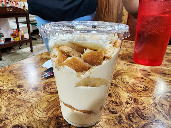 This banana pudding doesn't just satisfy a sweet tooth—it reconciles childhood memories with grown-up appreciation in layers of creamy nostalgia.