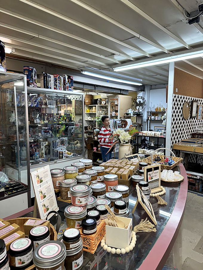 Handcrafted candles, homemade soaps, and artisanal goods line glass shelves, proof that small-batch Florida creativity is alive and well.