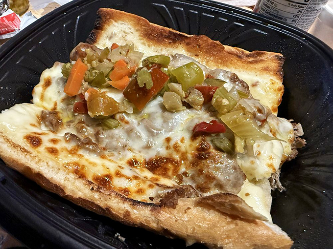 Not just any sandwich—a mountain of Italian beef topped with giardiniera that transforms lunch into an event worth rescheduling meetings for.